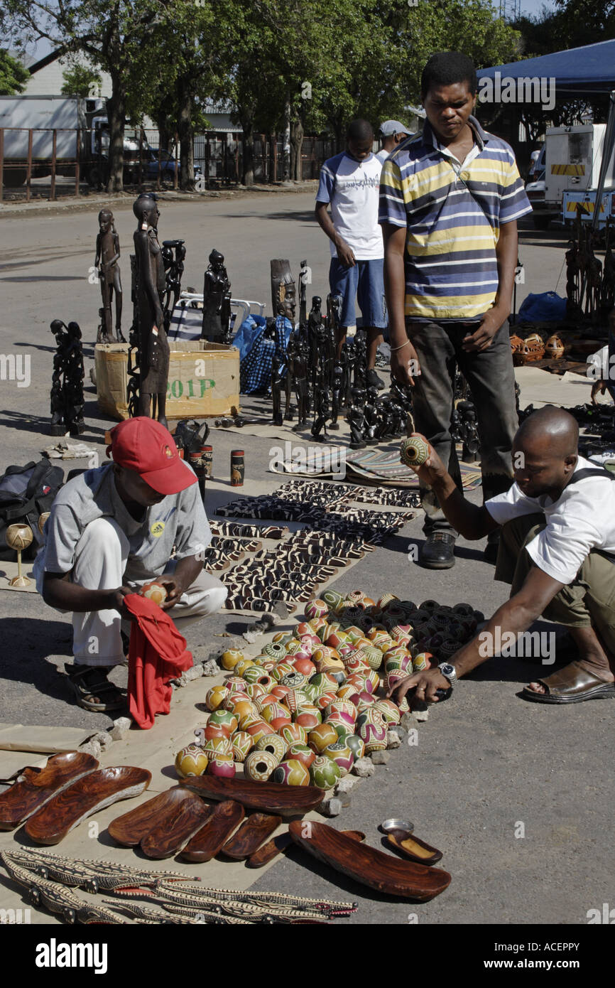 Vendors setting up their stall of woodcarvings, Saturday craft market ...