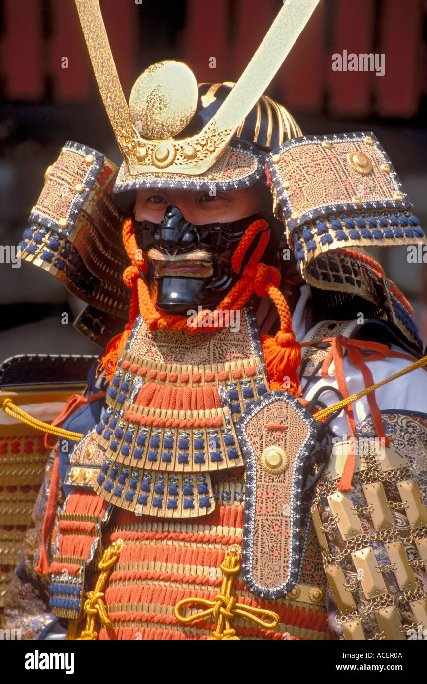 Man dressed in full samurai armor participates in the Sannosai festival ...