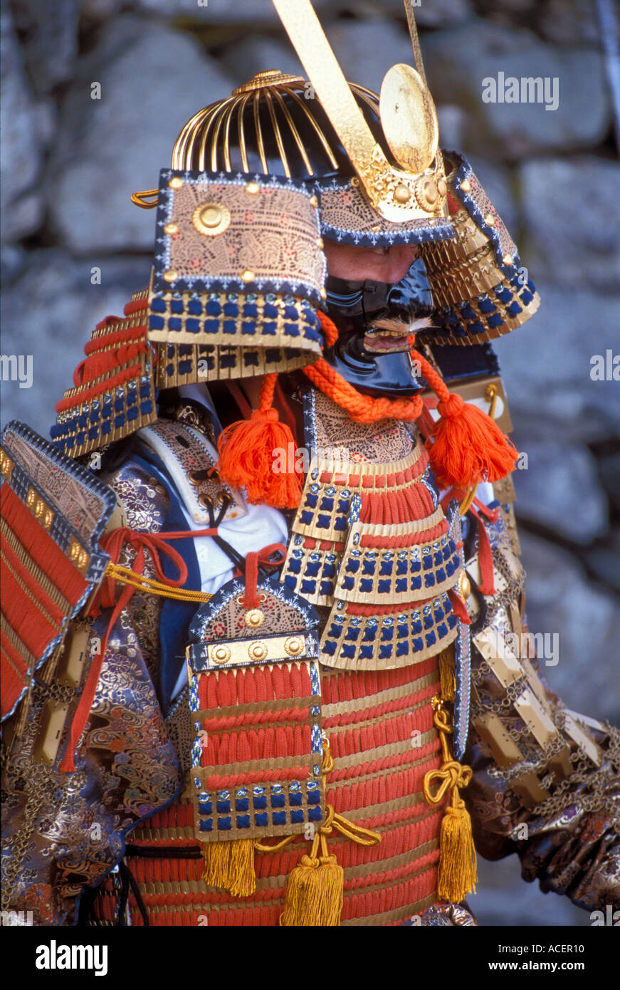 Man dressed in full samurai armor participates in the Sannosai Festival ...
