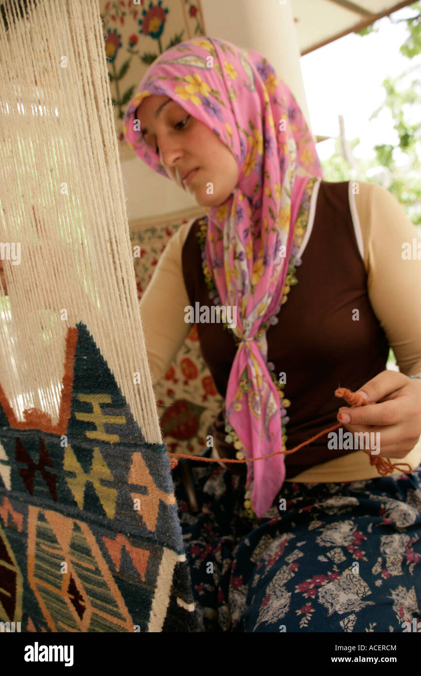 Weaving a kilim, Cappadocia, Turkey Stock Photo - Alamy