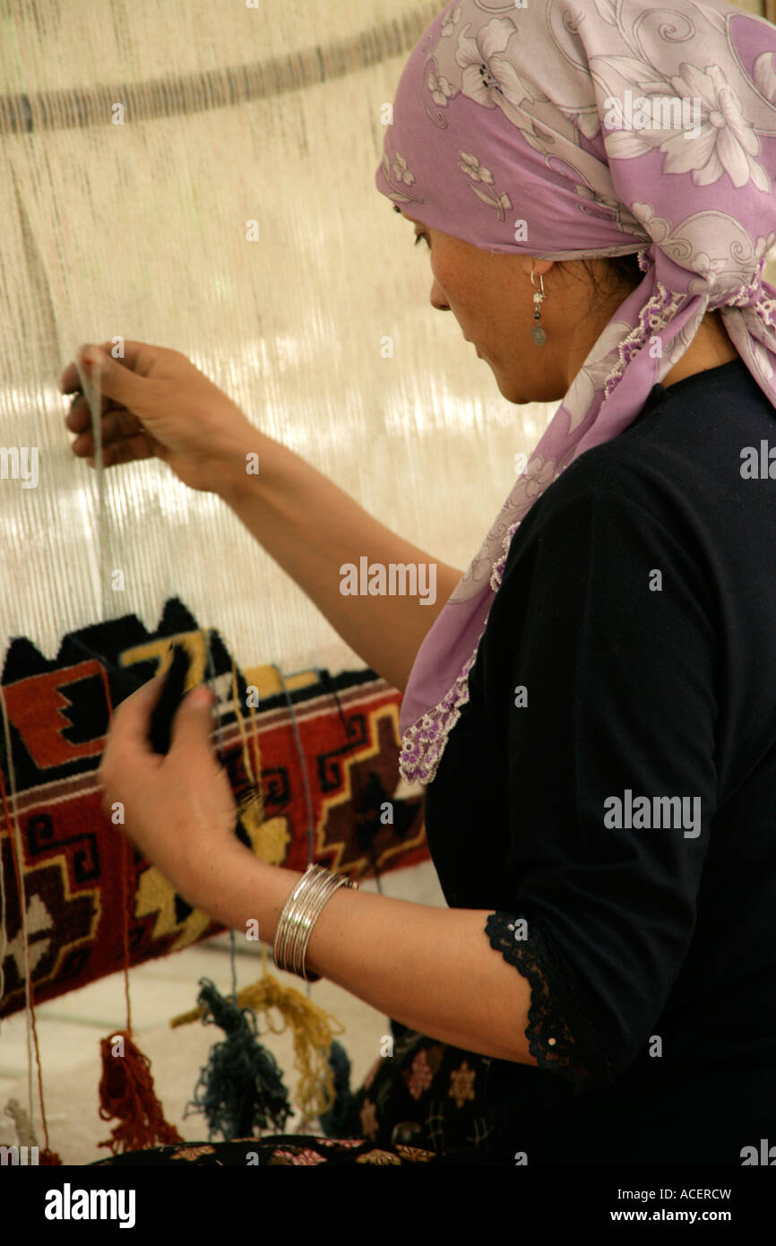 Weaving a kilim, Cappadocia, Turkey Stock Photo - Alamy