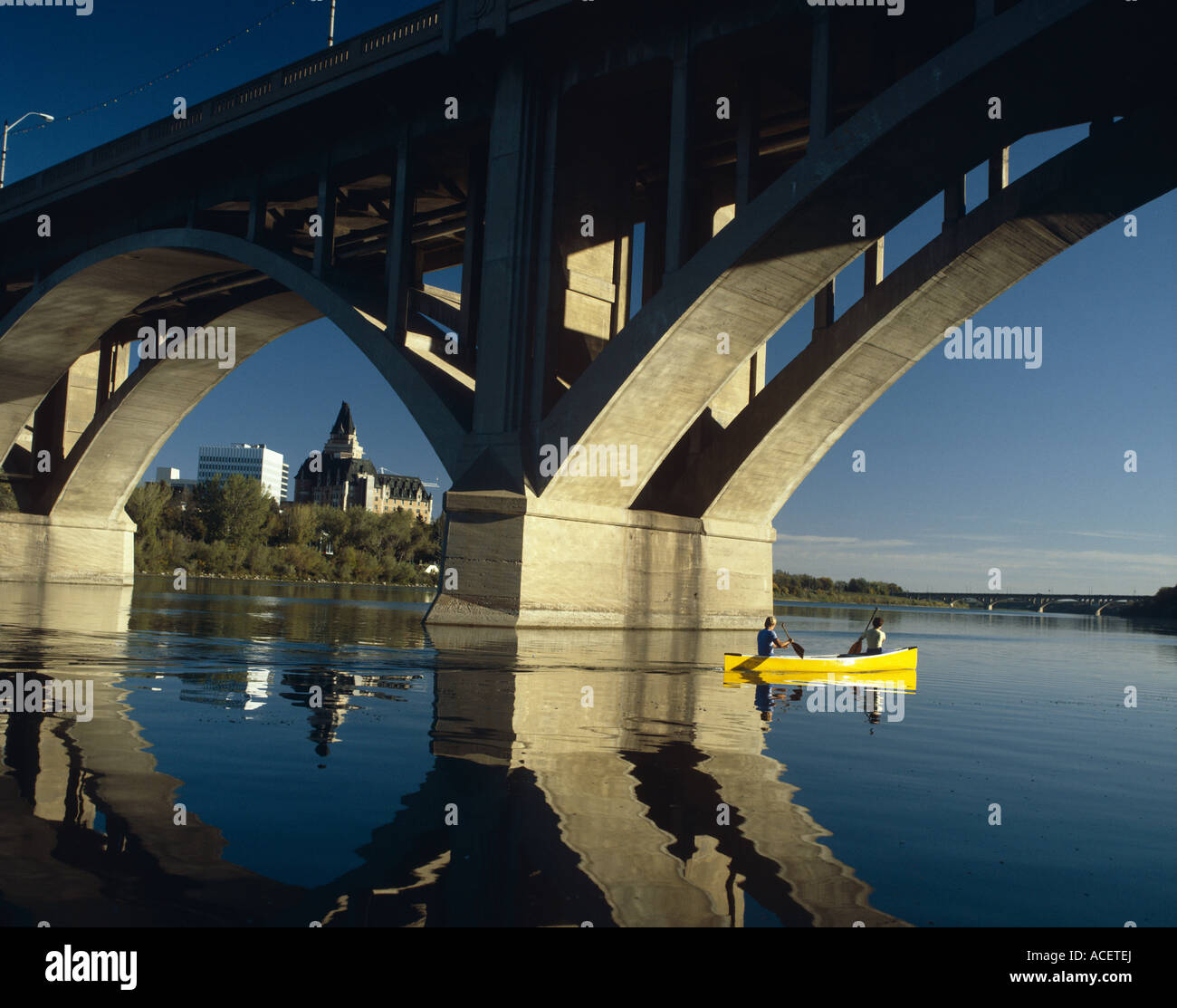 Paddling canoe under bridge hi-res stock photography and images - Alamy