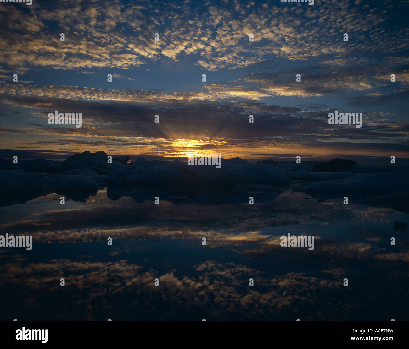 Sky sunset reflection in water Stock Photo - Alamy