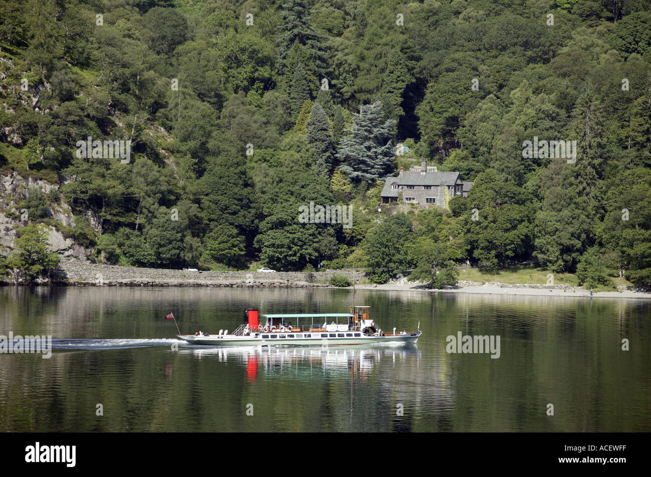 A steamer ferry on Ullswater in the Lake District Cumbria England UK ...