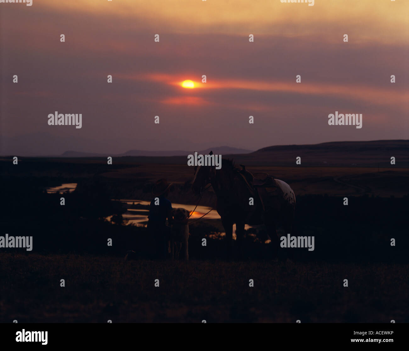 Camp and sunset Stock Photo - Alamy