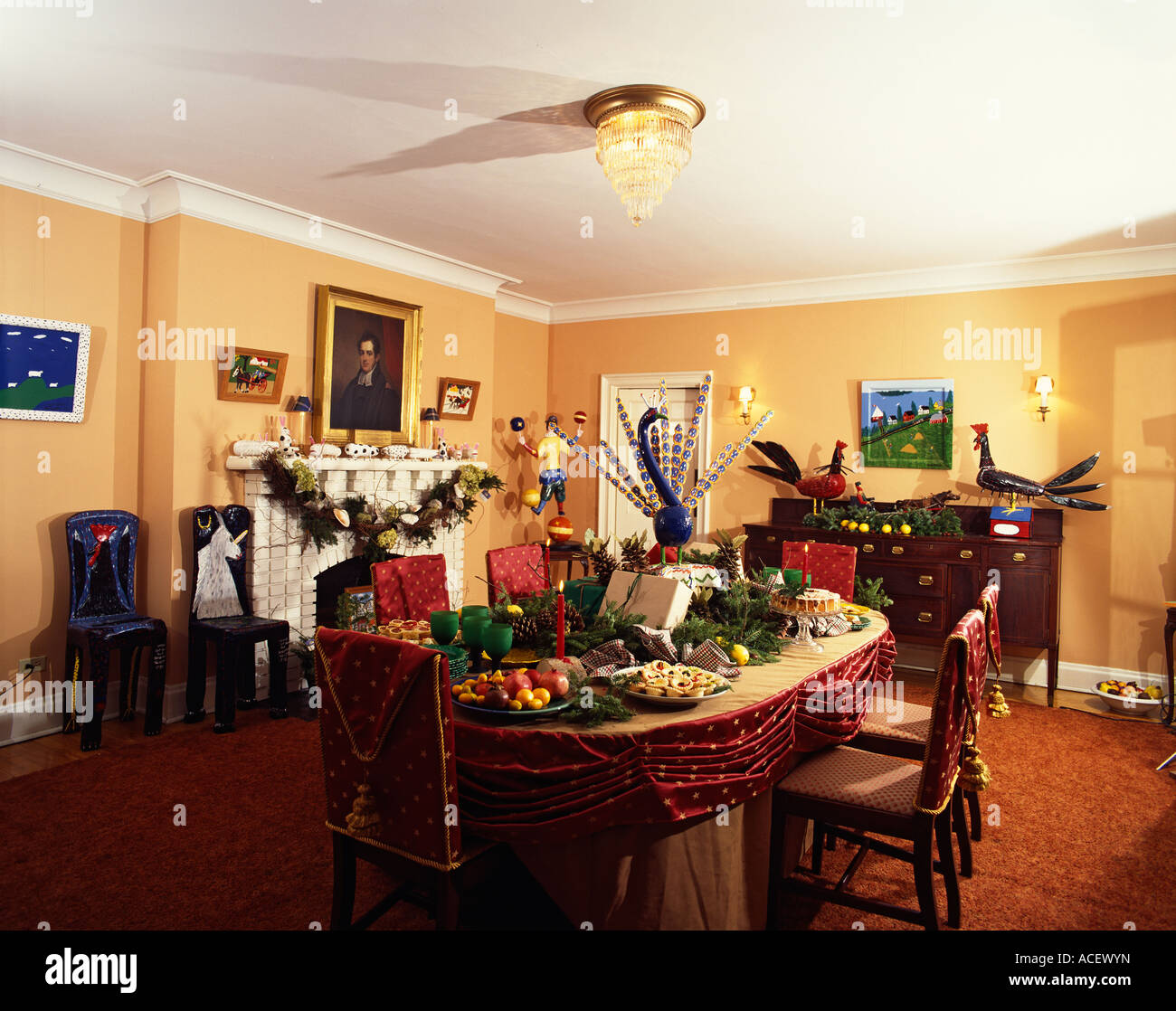 Formal dining room with folk art Stock Photo - Alamy