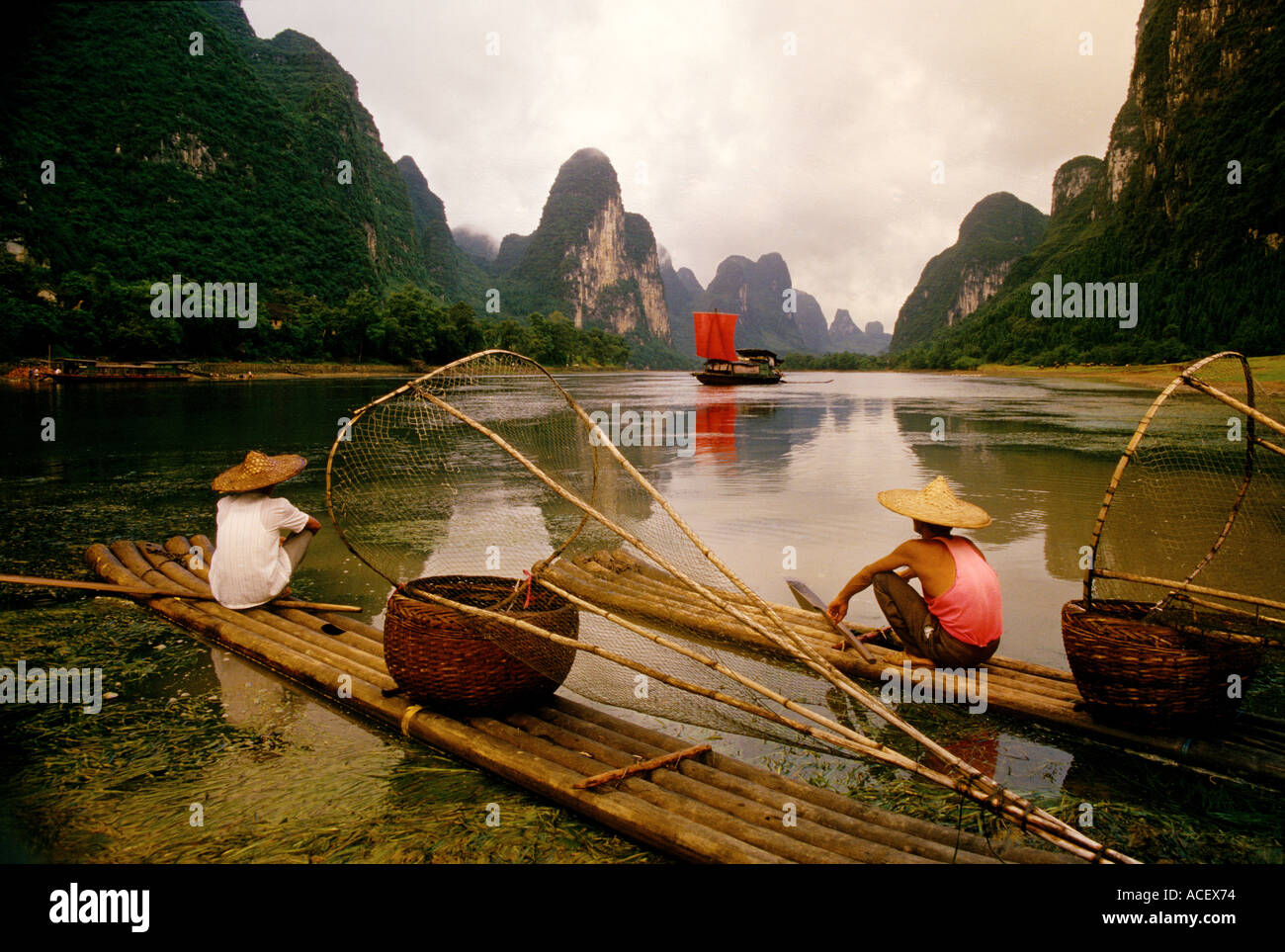 Li River Guangxi China Cormorant fishermen at rest of their bamboo ...