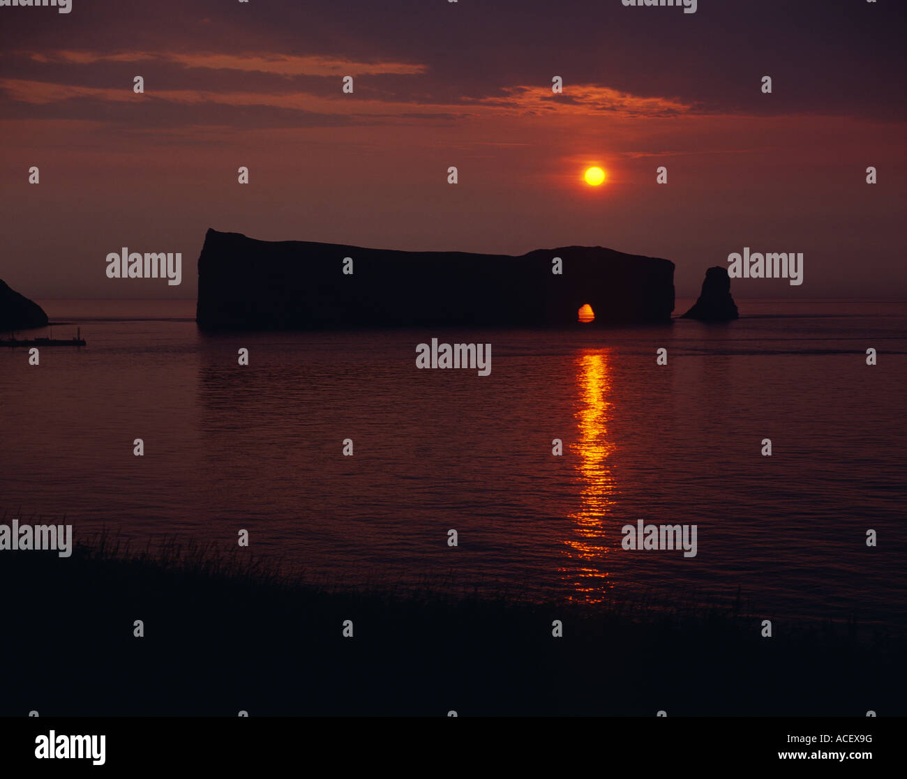 Quebec sunset island rock perce Stock Photo - Alamy