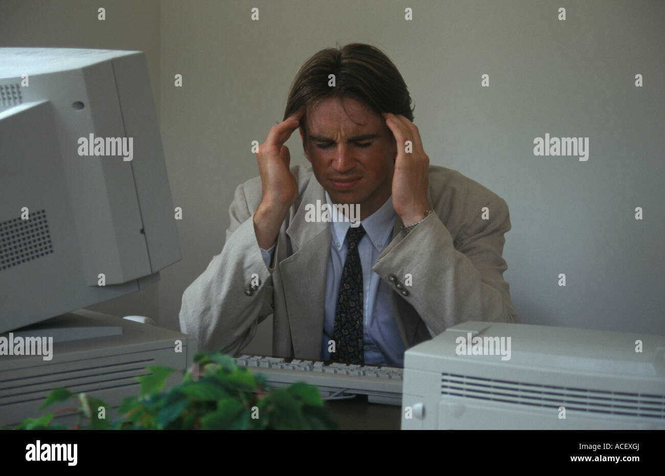 stressed man at work Stock Photo - Alamy