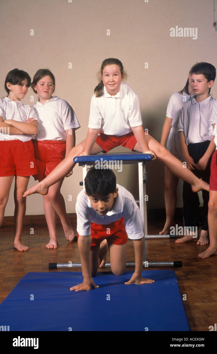 primary school children doing gym Stock Photo - Alamy
