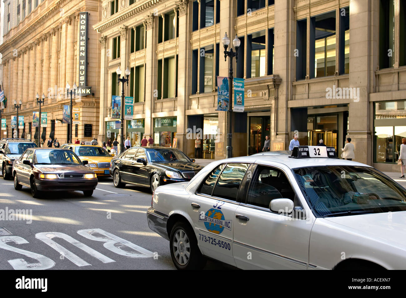 FINANCE Chicago Illinois Several taxi cabs and cars in Financial ...