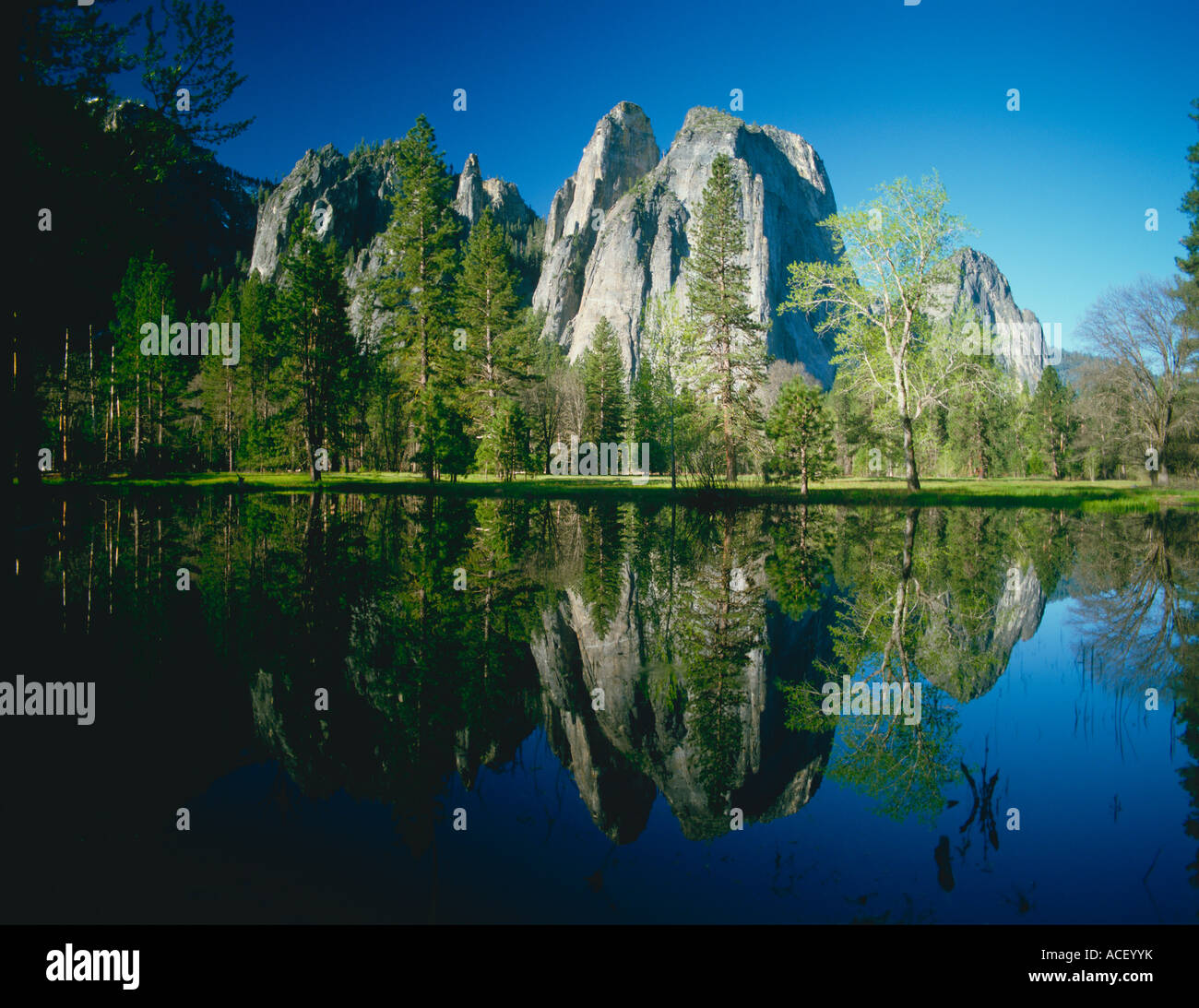 Mountains with reflection on water Stock Photo - Alamy