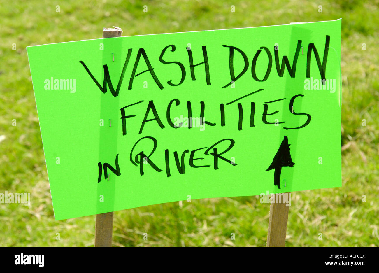 WASH DOWN FACILITIES IN RIVER sign at annual World Mountain Bike Bog ...
