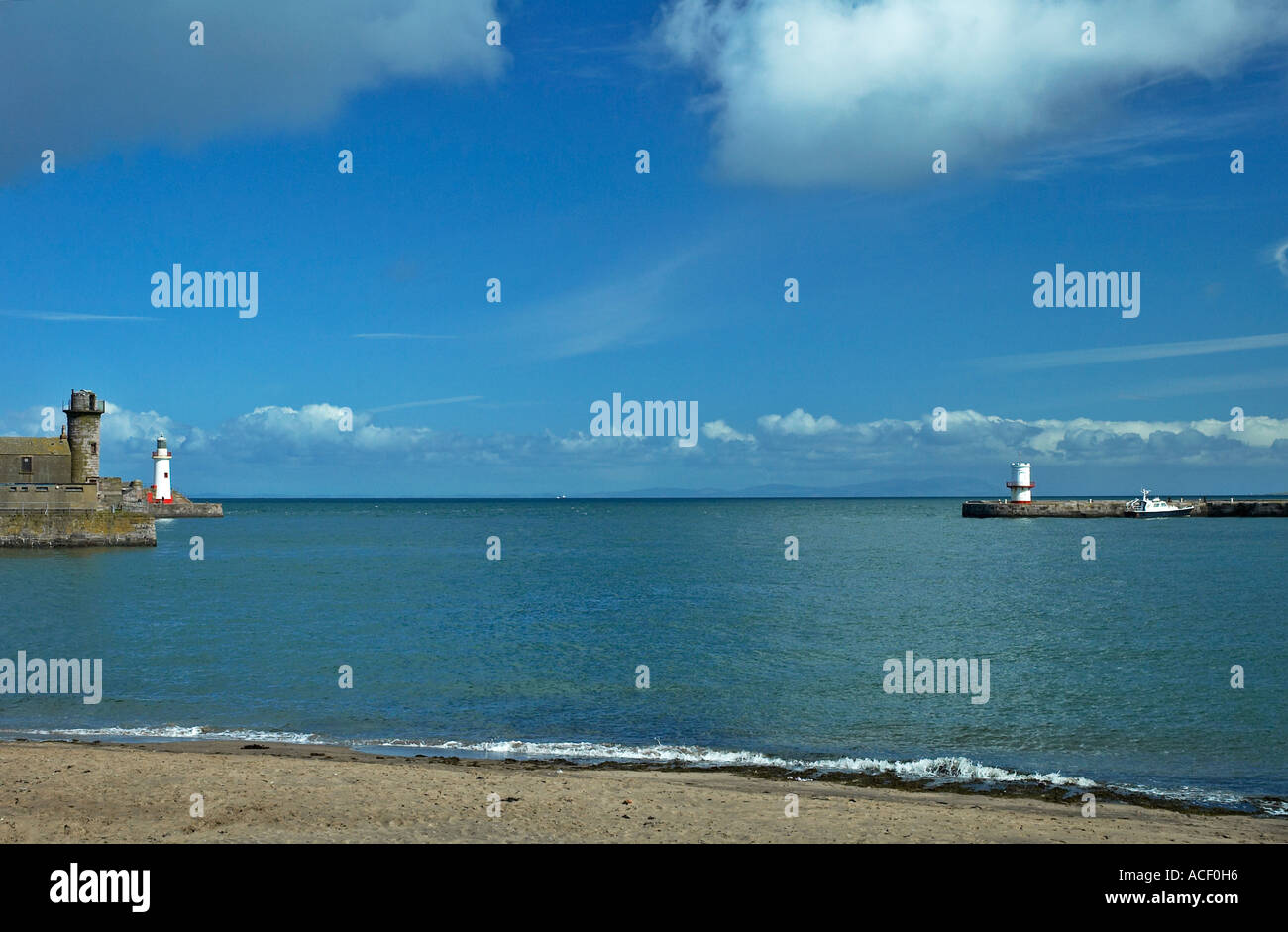 Entrance and Lighthouse to the Port of Whitehaven Stock Photo - Alamy