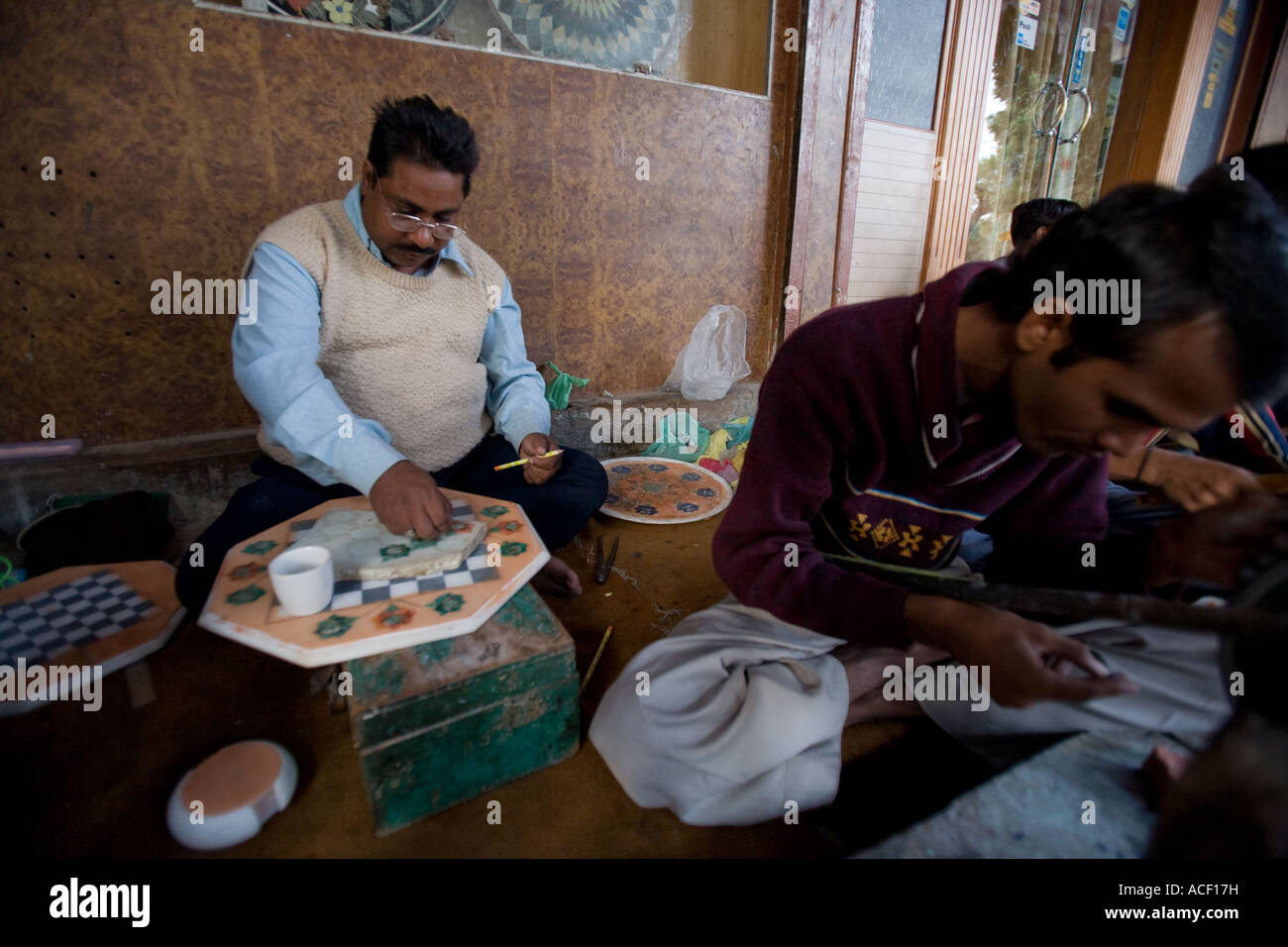 Man working on marble carving Stock Photo - Alamy