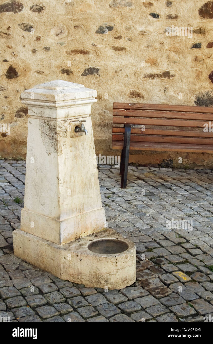 Communal water tap Stock Photo - Alamy