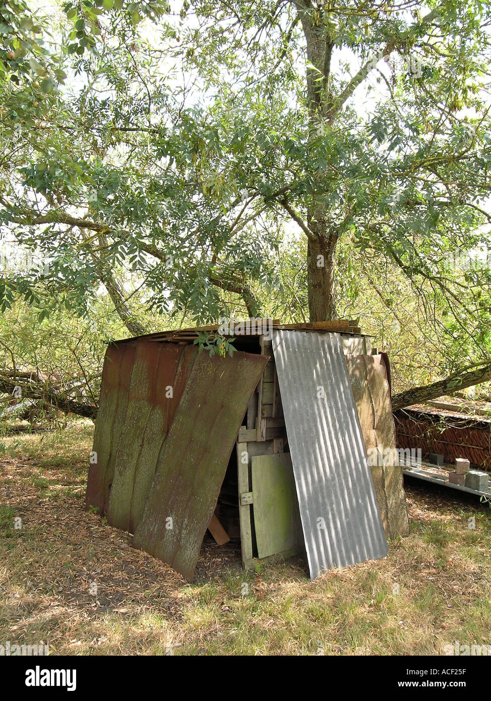 Children s play hut under tree France Stock Photo - Alamy