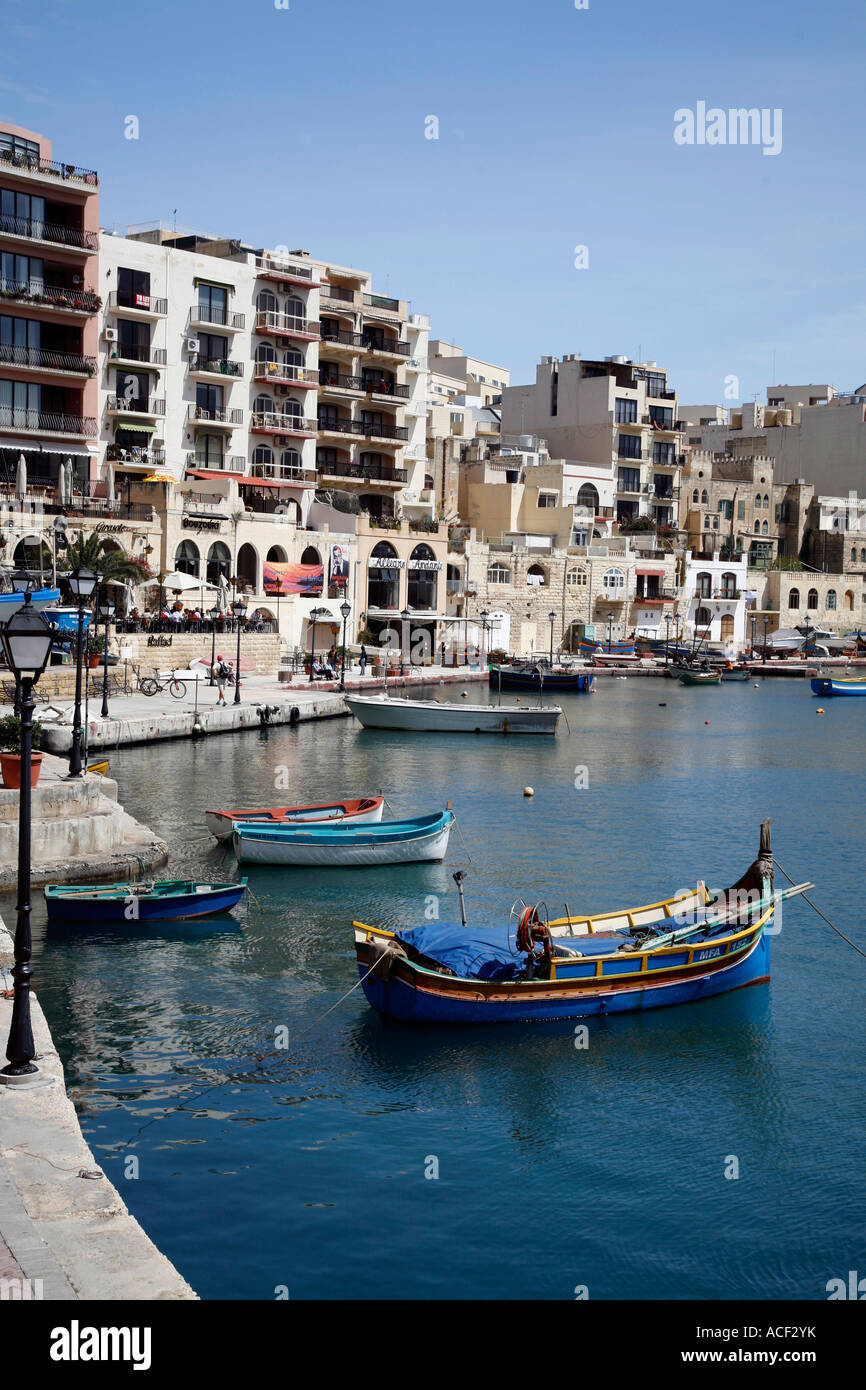 Luzzu boat, in St Julian's bay, Malta Stock Photo - Alamy