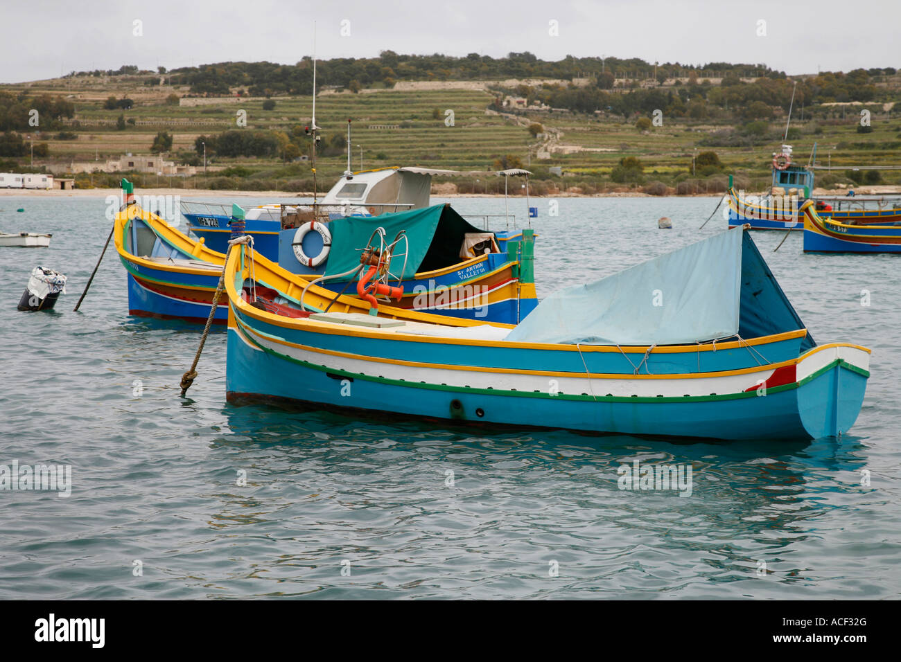 Luzzu boats at Marsacala Bay, Malta Stock Photo - Alamy