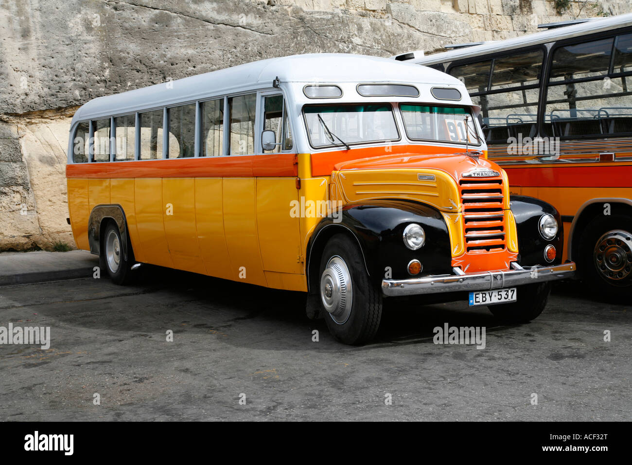 Old yellow bus in Malta Stock Photo - Alamy