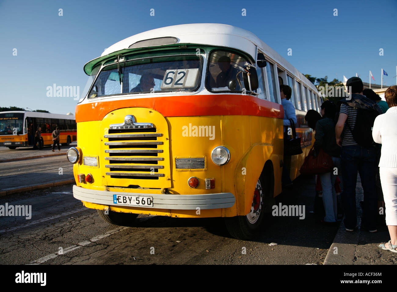 Yellow coach in Malta Stock Photo - Alamy