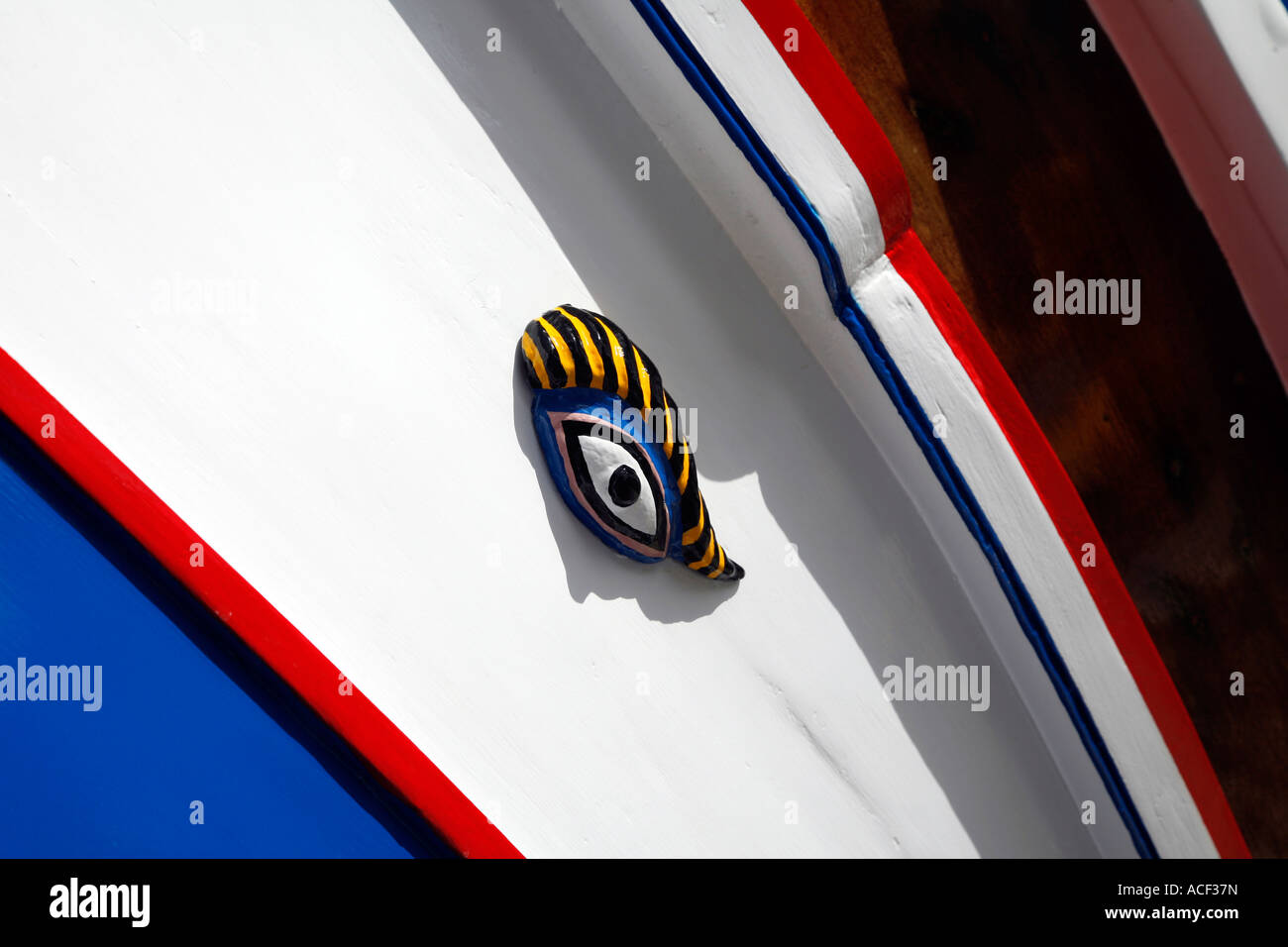 Luzzu boat eye in Malta Stock Photo - Alamy