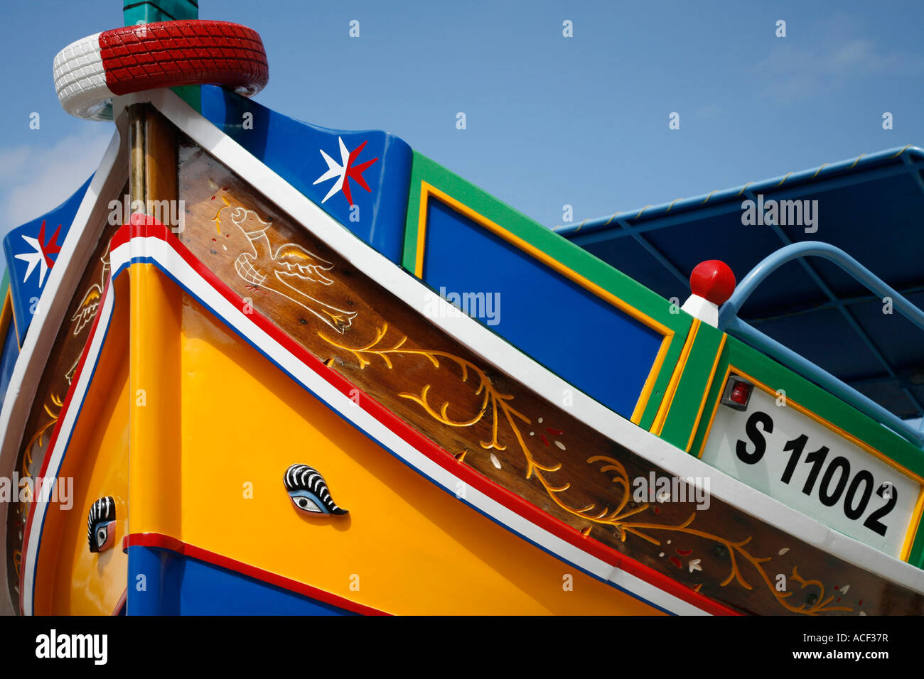 Luzzu boat in Malta showing the Osiris eye Stock Photo - Alamy