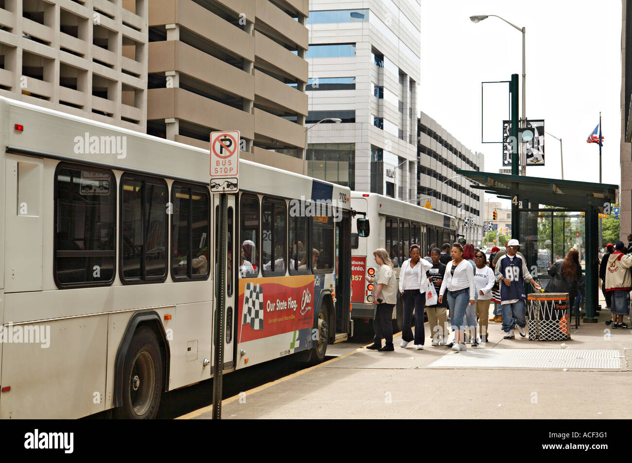 INDIANA Indianapolis Public buses at busy bus stop in downtown business ...
