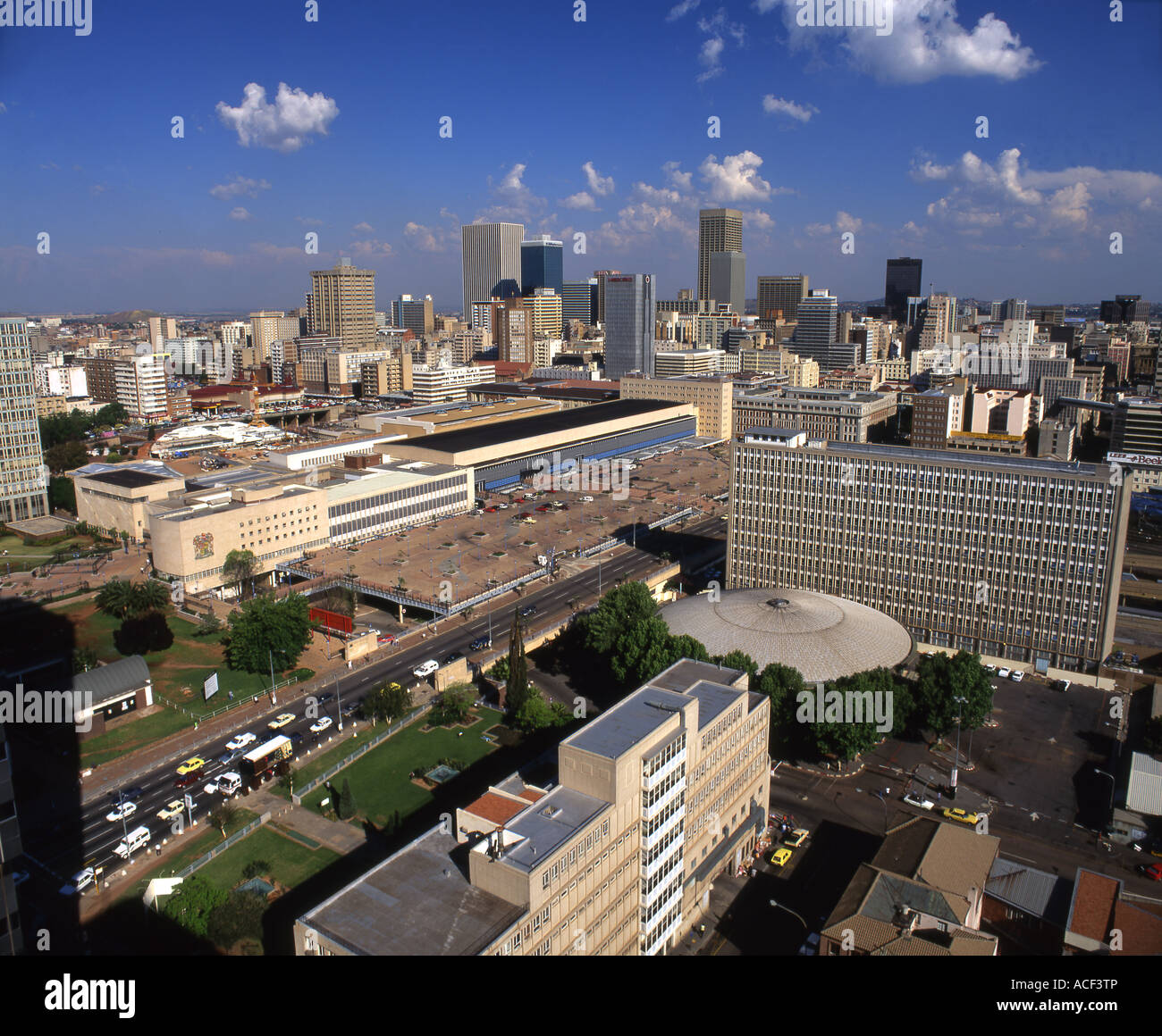 An aerial view of the Johannesburg railway station in the foreground ...