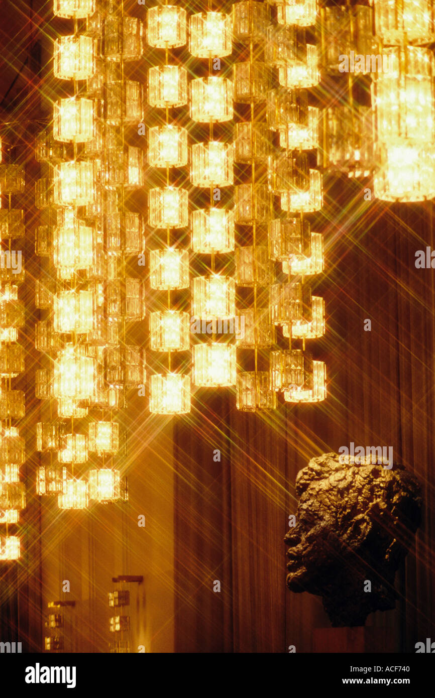Bronze bust of John Kennedy under crystal chandeliers in the Grand ...