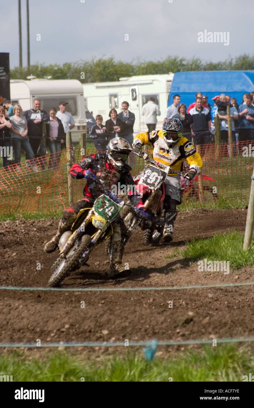Group of Motocross riders cornering during race Stock Photo - Alamy