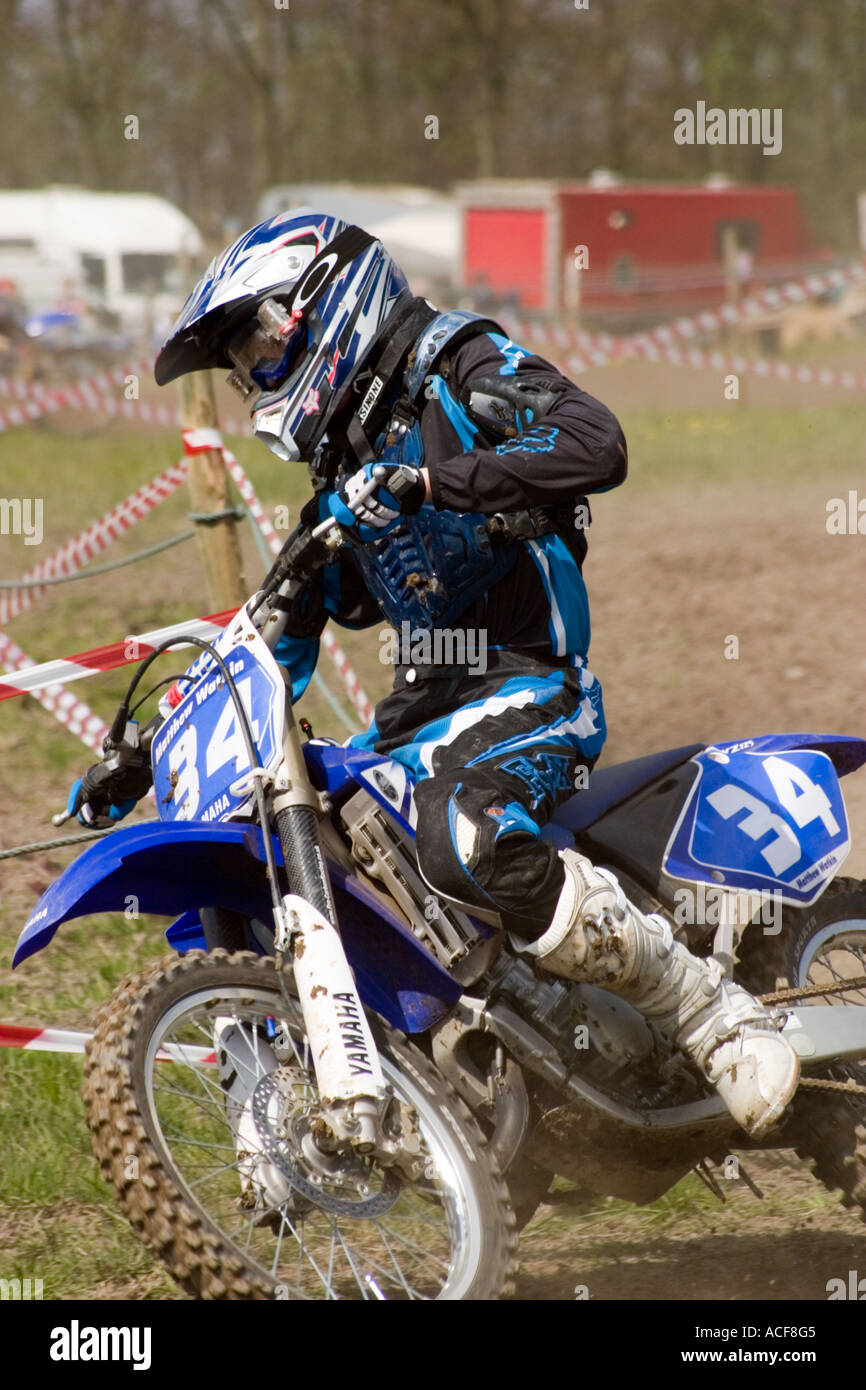 Motocross rider cornering during race Stock Photo - Alamy