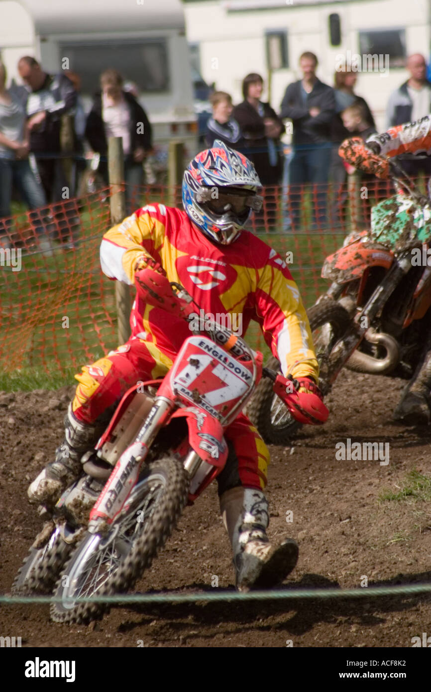 Motocross rider cornering during race Stock Photo - Alamy