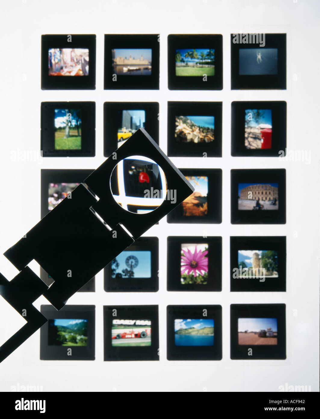 Lightbox with 35mm transparencies and Lupe Stock Photo - Alamy