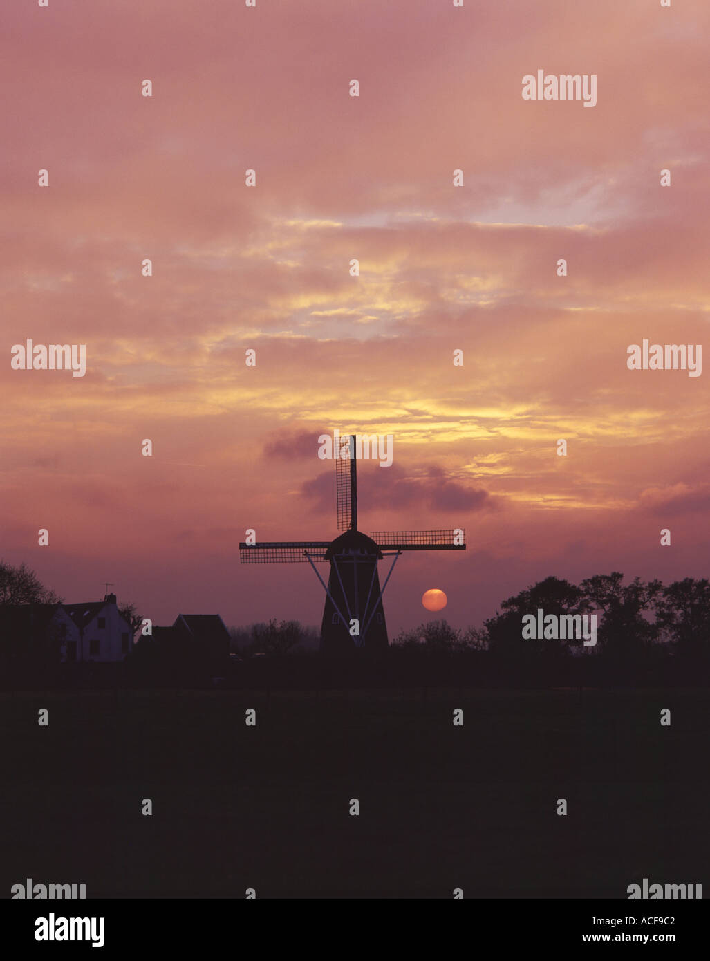 Windmill at sunset Beesd Holland Stock Photo - Alamy