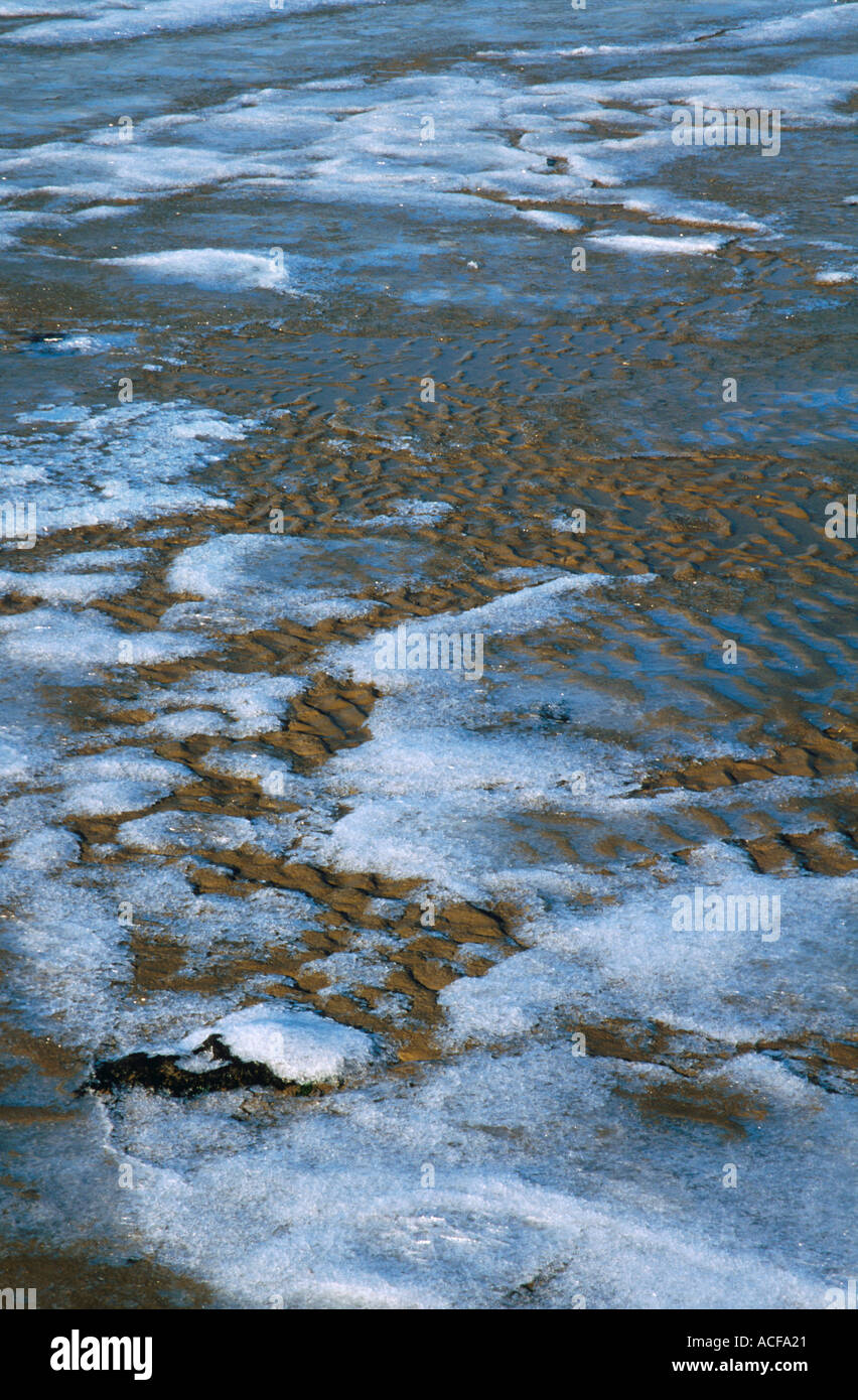 Ice on sand Poole Dorset England UK Stock Photo - Alamy