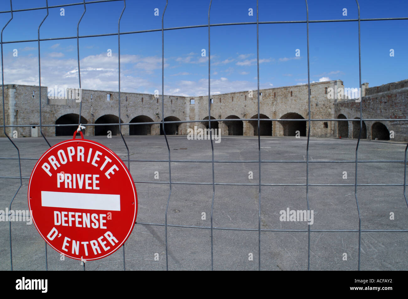 The harbour wall at Antibes in the South of France, with an access ...