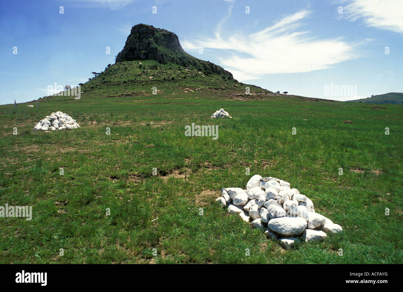 Isandlwana hill or Sphinx with soldiers graves in foreground This is ...