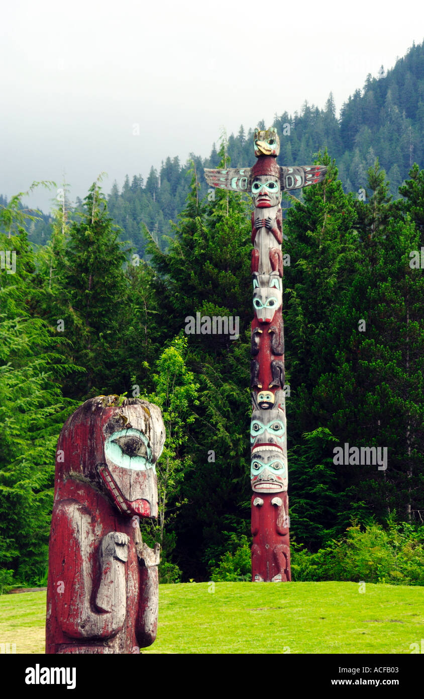 Totem poles in Saxman Village near Ketchikan Alaska Stock Photo - Alamy