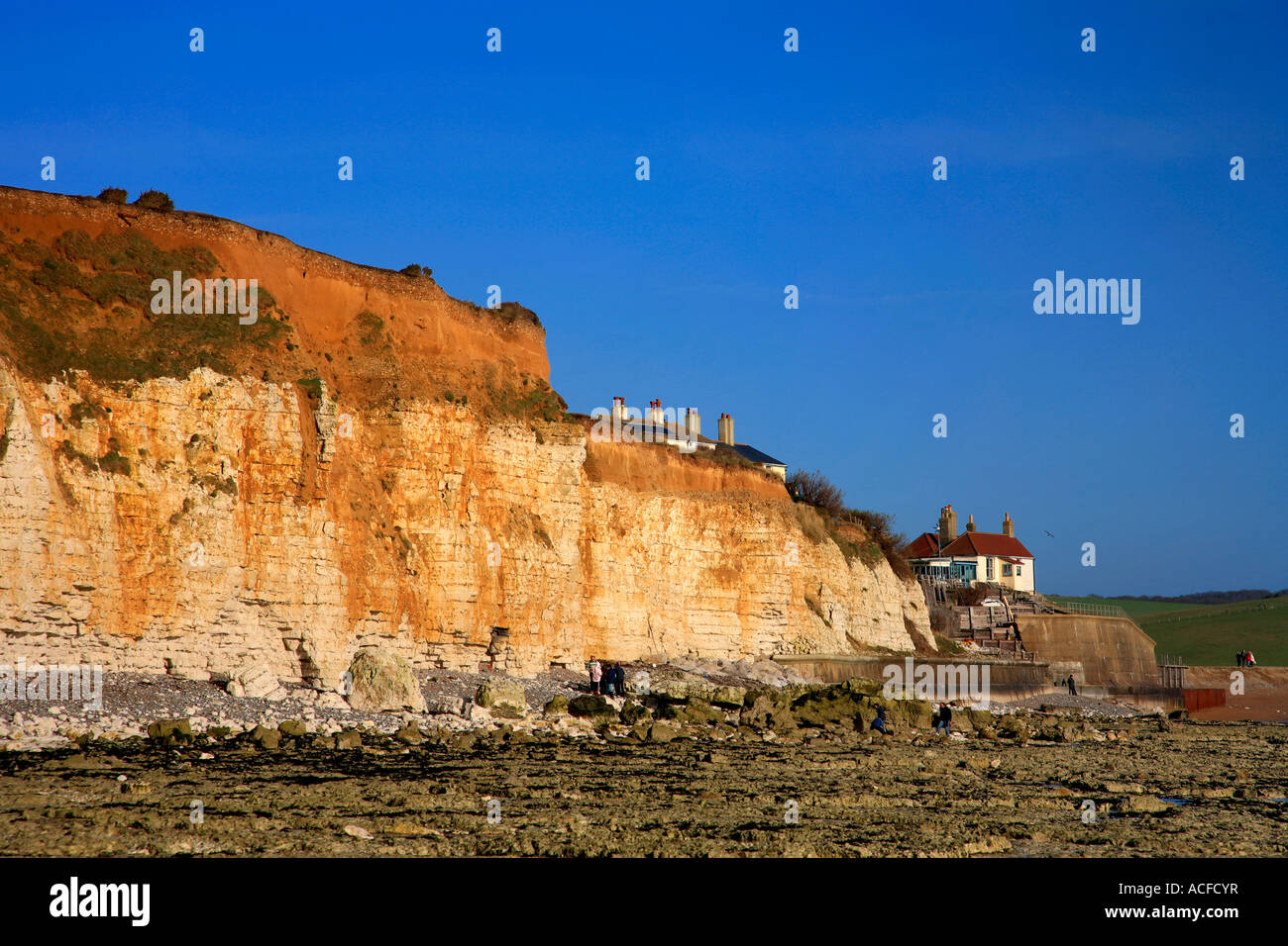 Brownstone cliff tops from the beach at Seaford Head, South Downs Way ...