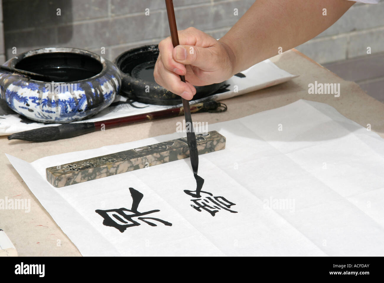 Writing in ink in Xi'an china Stock Photo - Alamy