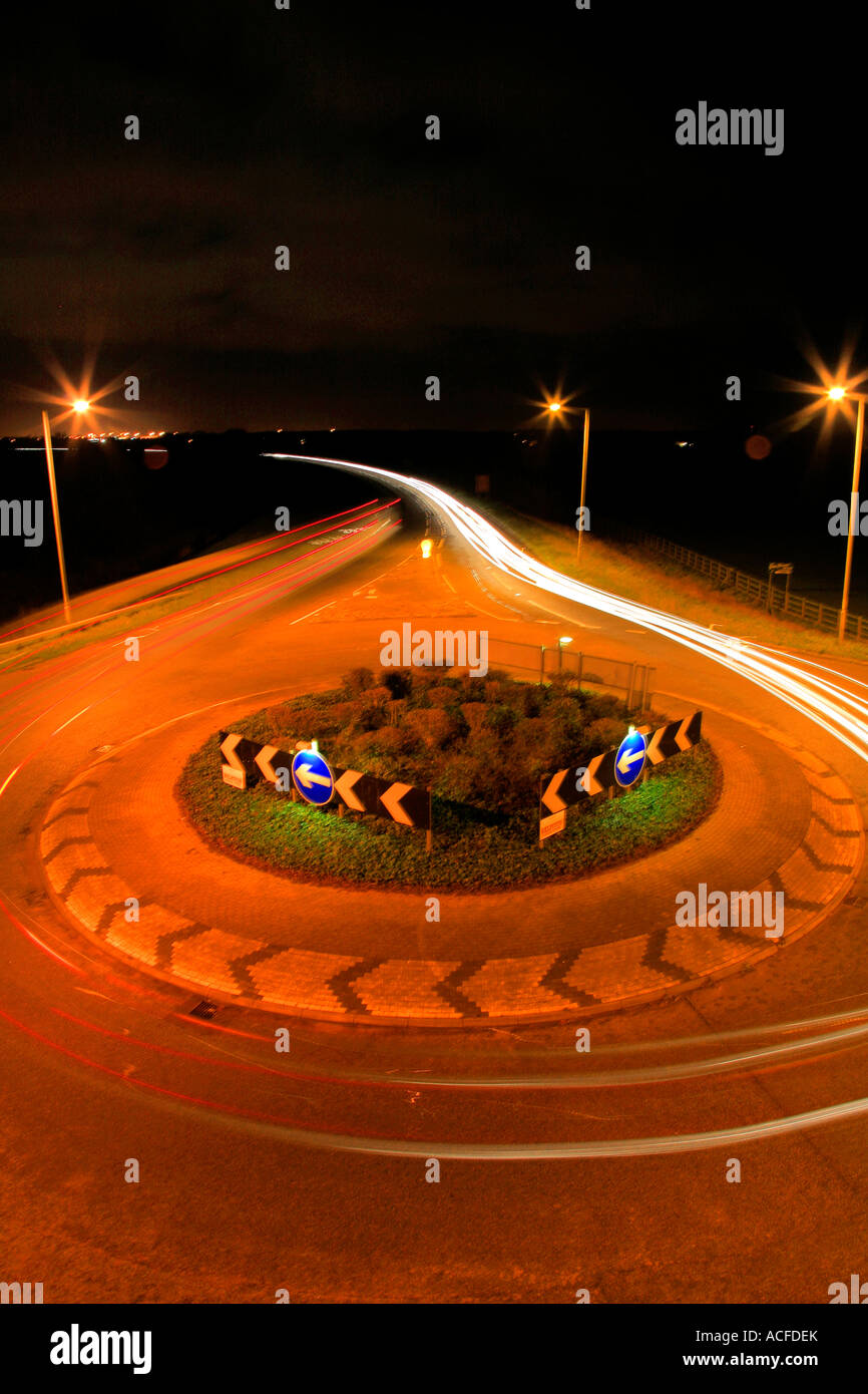 Speeding light trails from traffic on a busy road at night, generic ...