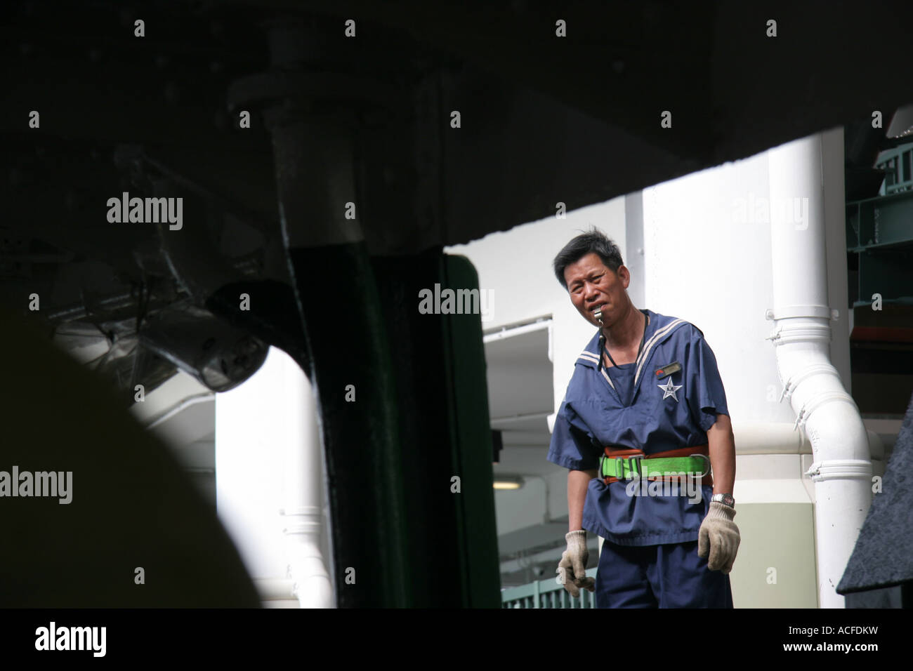 Star Ferry employee Hong Kong Stock Photo - Alamy