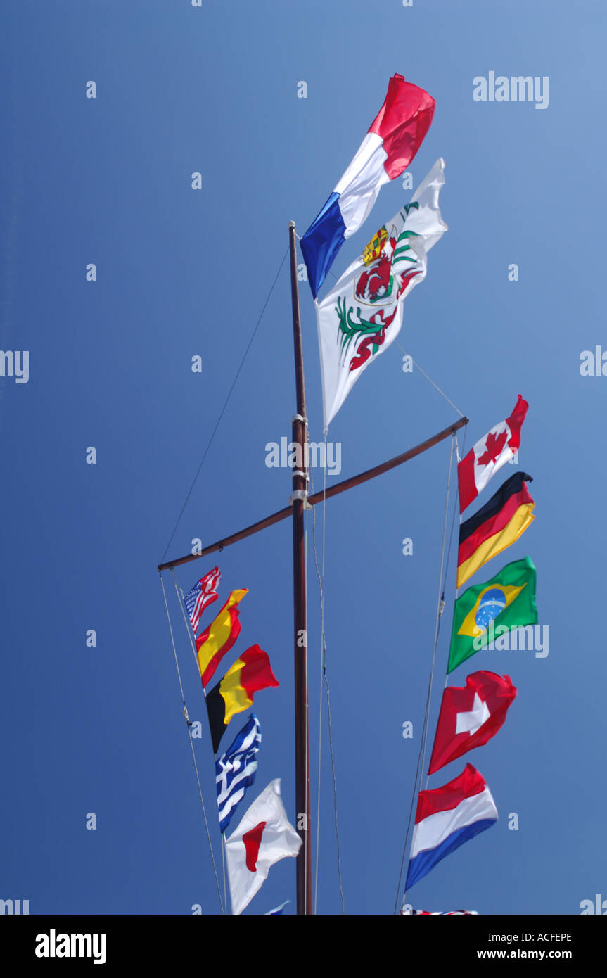 International flags flying on flagpoles hi-res stock photography and ...