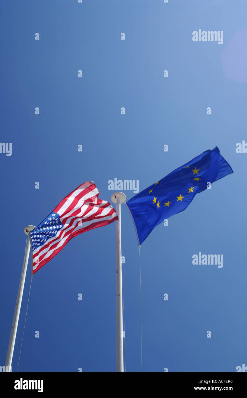 US and EU flags flying side by side in a blue sky Stock Photo - Alamy