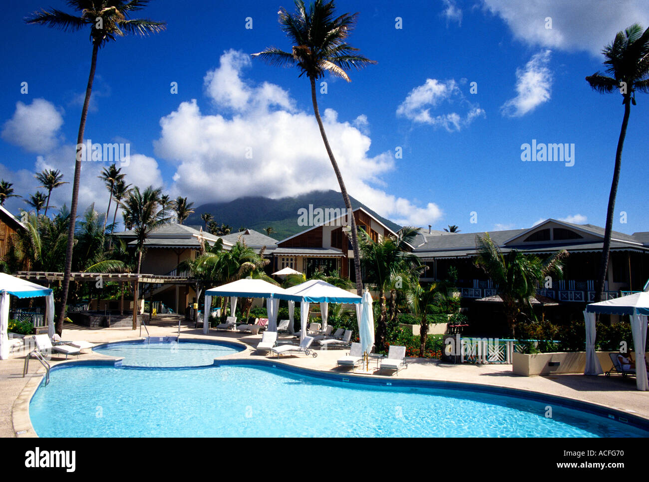 Nevis West Indies Four Seasons Resort Pool with Nevis Peak in distance ...