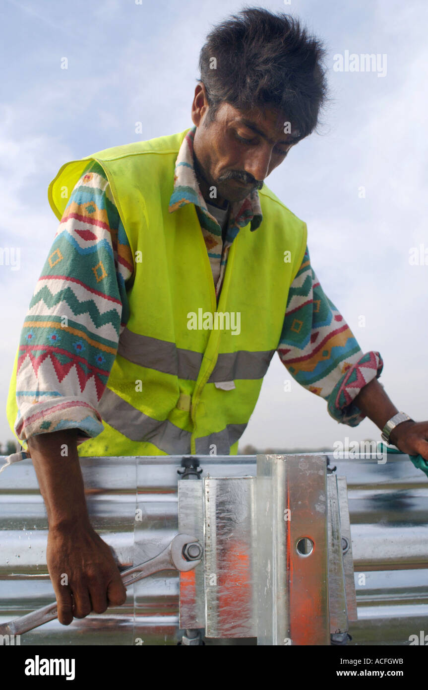 Laying road - workers constructing the M5 toll motorway in Hungary ...