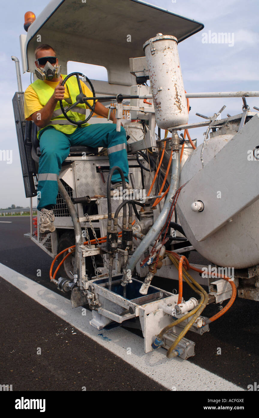 Laying road - workers constructing the M5 toll motorway in Hungary ...