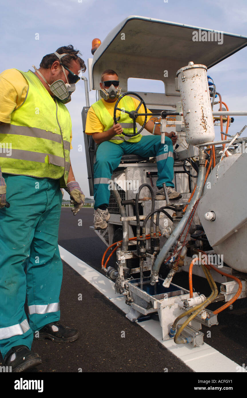 Laying road - workers constructing the M5 toll motorway in Hungary ...