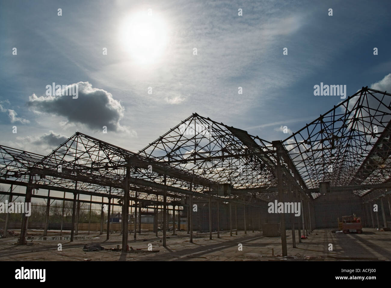 Steel framed structure of ruined warehouse or factory Stock Photo - Alamy